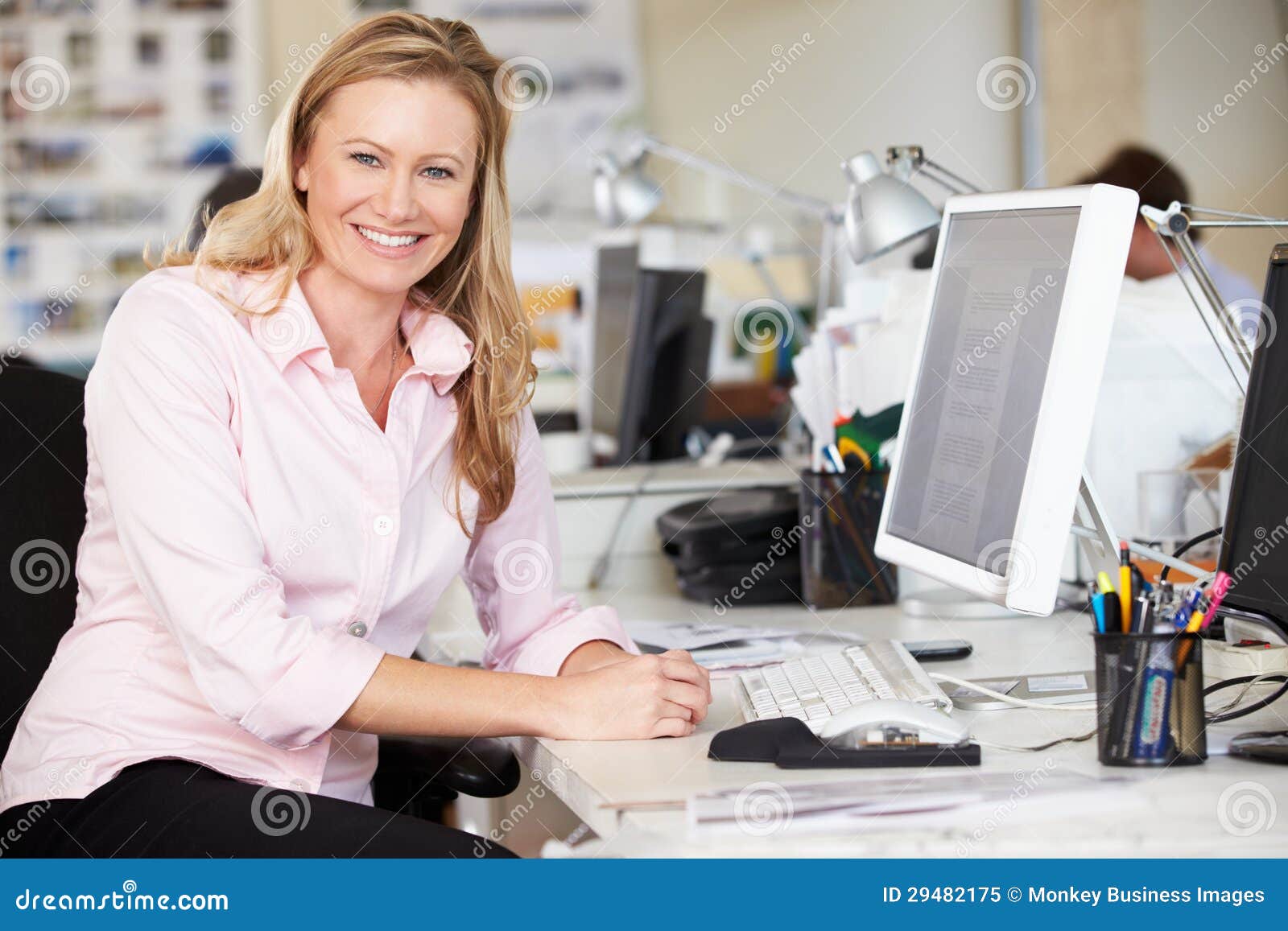 Woman Working at Desk in Busy Creative Office Stock Image - Image of ...