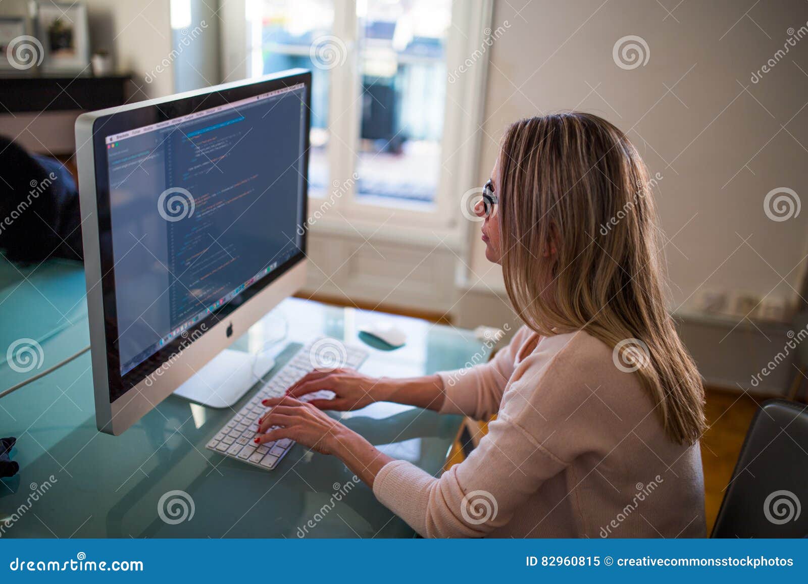 Woman Working On Desktop Computer Picture. Image: 82960815