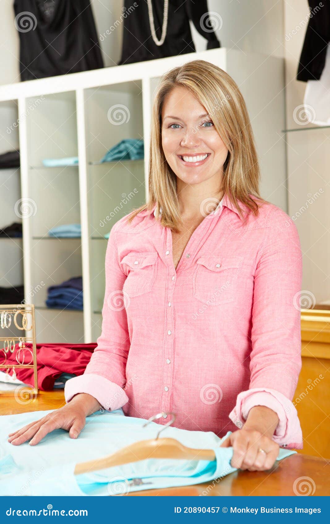 Woman Working in Fashion Store Stock Image - Image of portrait, serve ...
