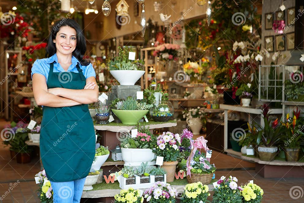 Woman working in florist stock photo. Image of person - 20892110