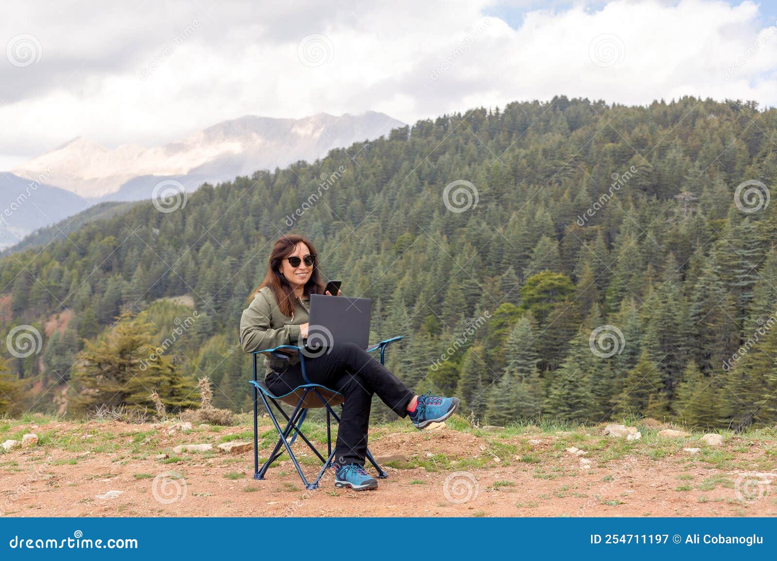Woman Working with Her Computer in Nature, Working with a Computer in ...