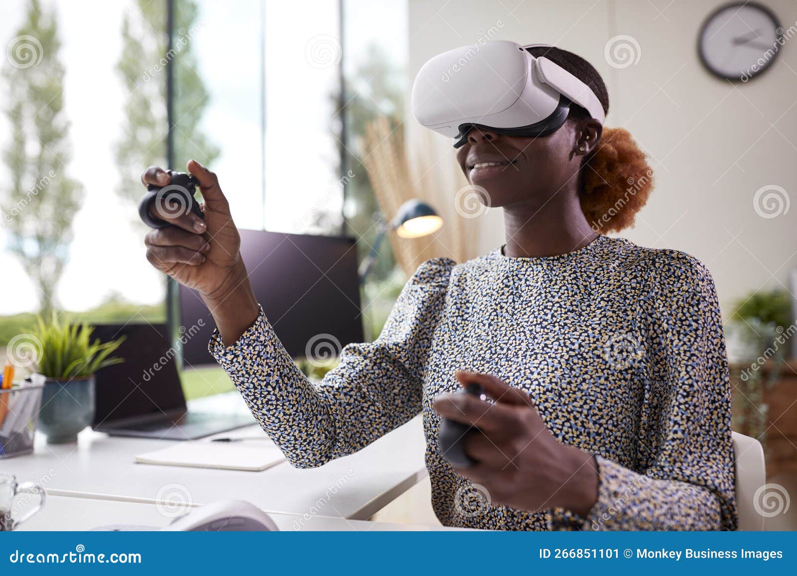 Woman Working From Home Office With Controllers Wearing VR Headset ...