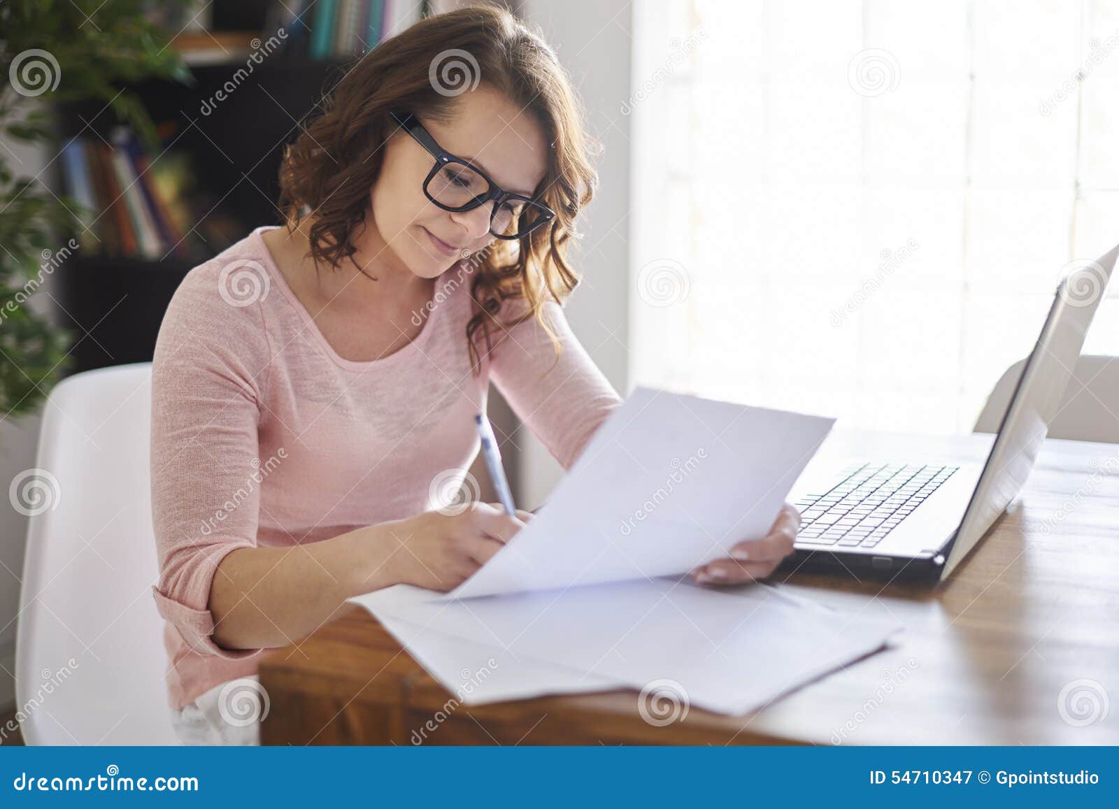 Woman working at home stock image. Image of interior - 54710347