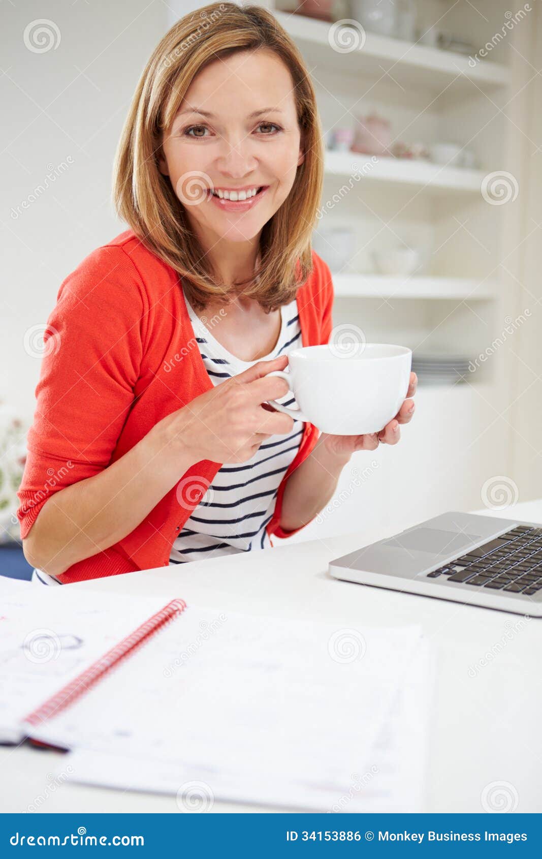 Woman Working from Home Using Laptop in Kitchen Stock Photo - Image of ...