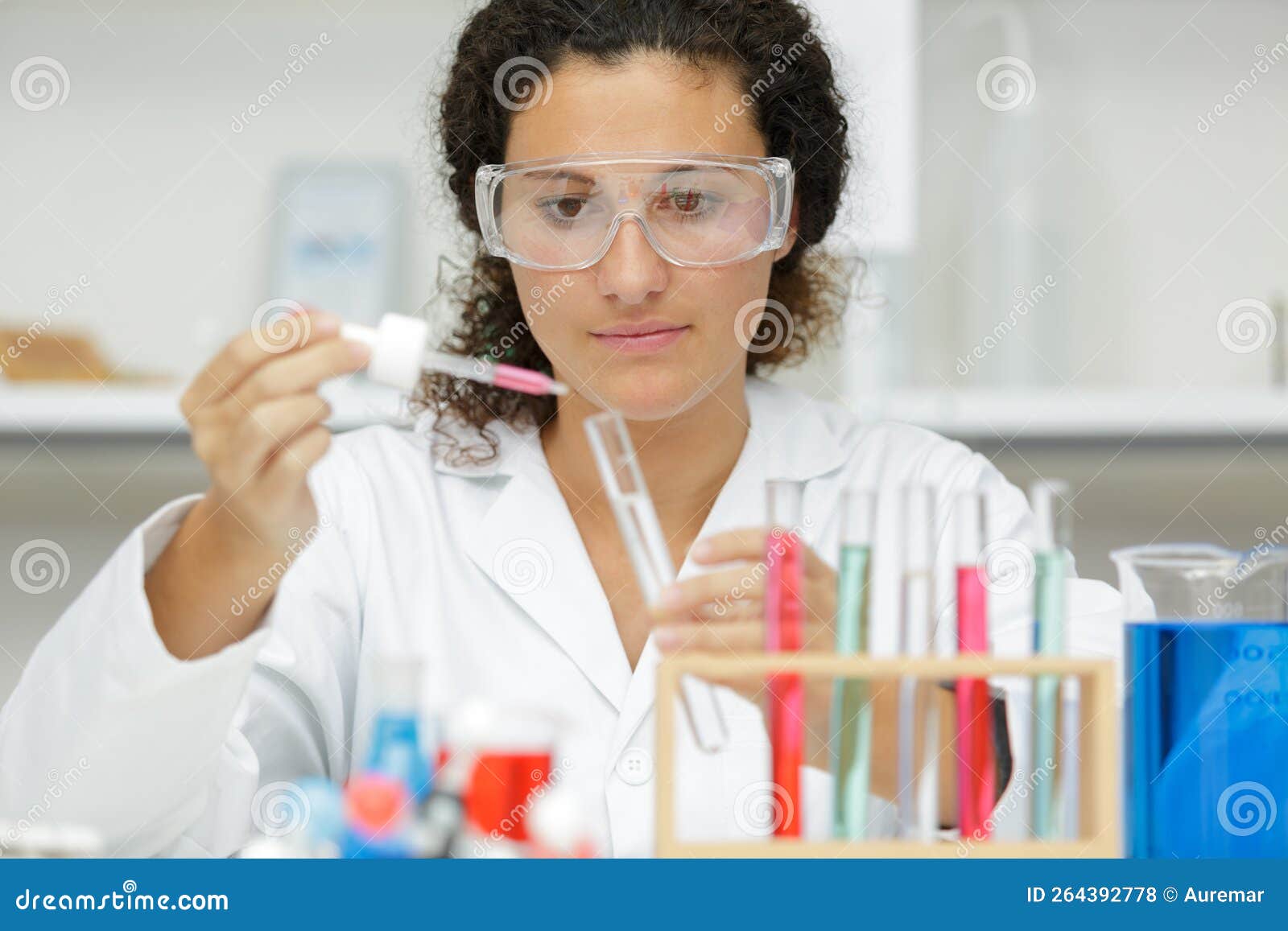 Woman working in lab stock photo. Image of microbiology - 264392778