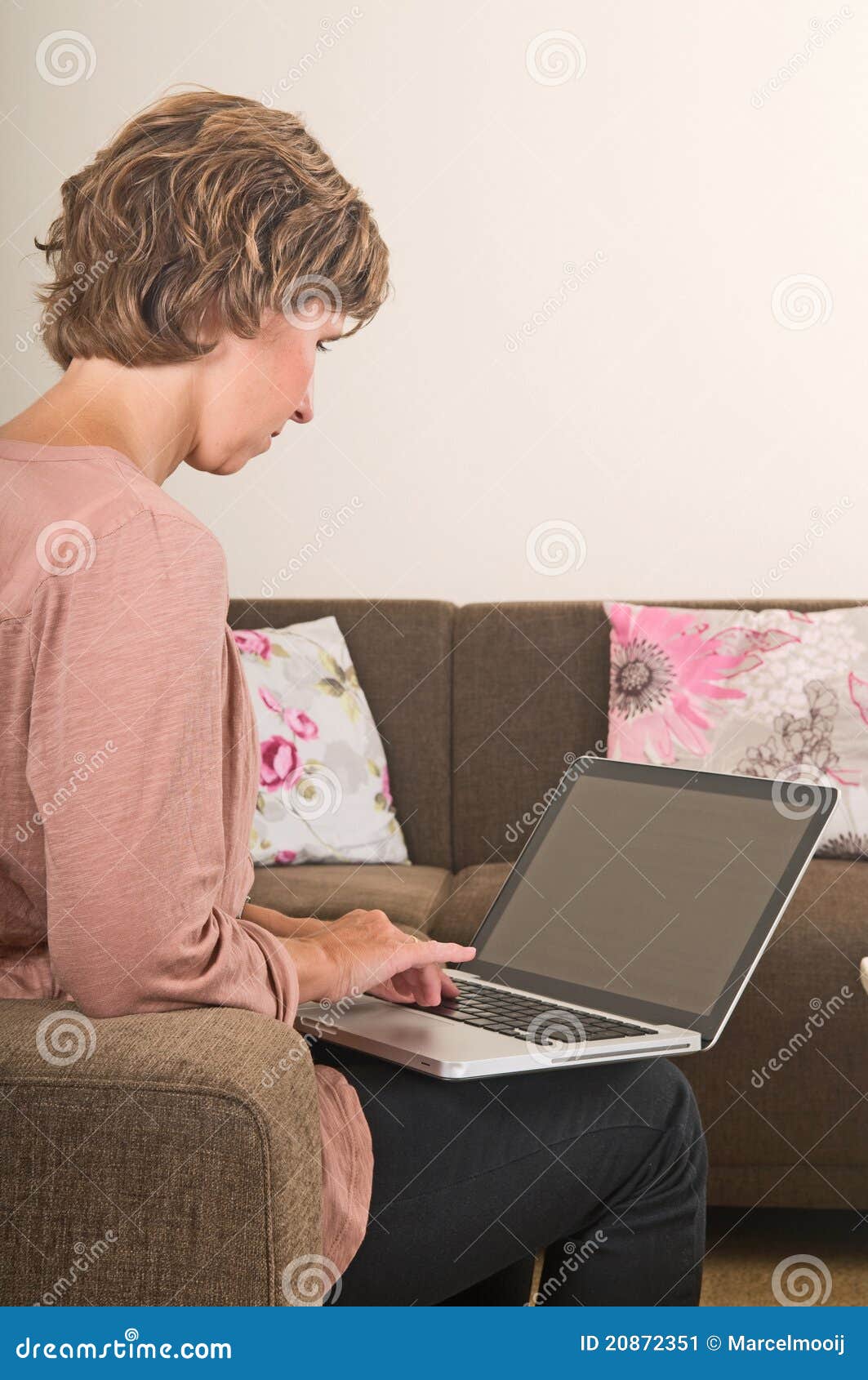 Woman working on a laptop stock image. Image of charm - 20872351