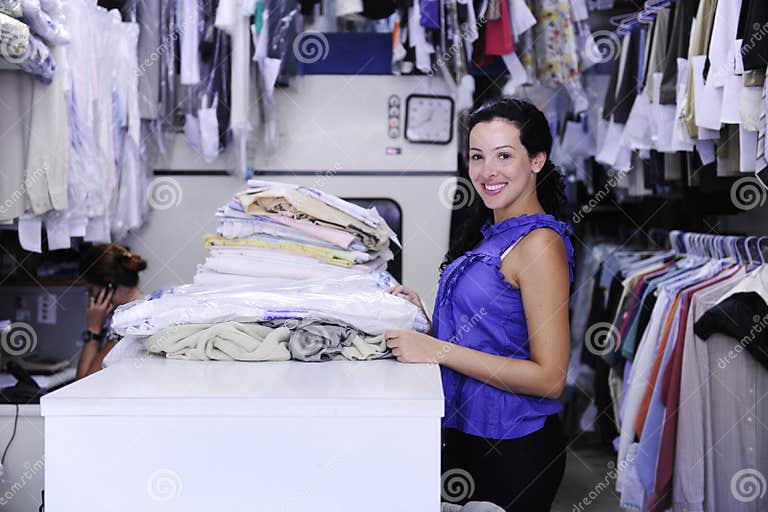 Woman working at a laundry stock image. Image of laundry - 12830757