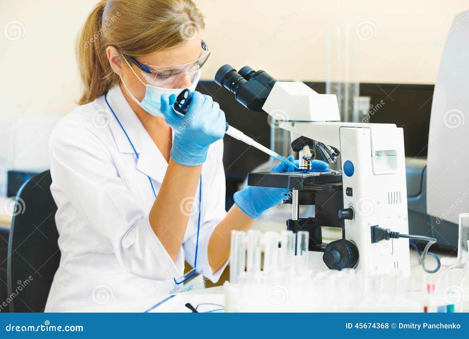 Woman Working with a Microscope. Stock Photo - Image of laboratory ...