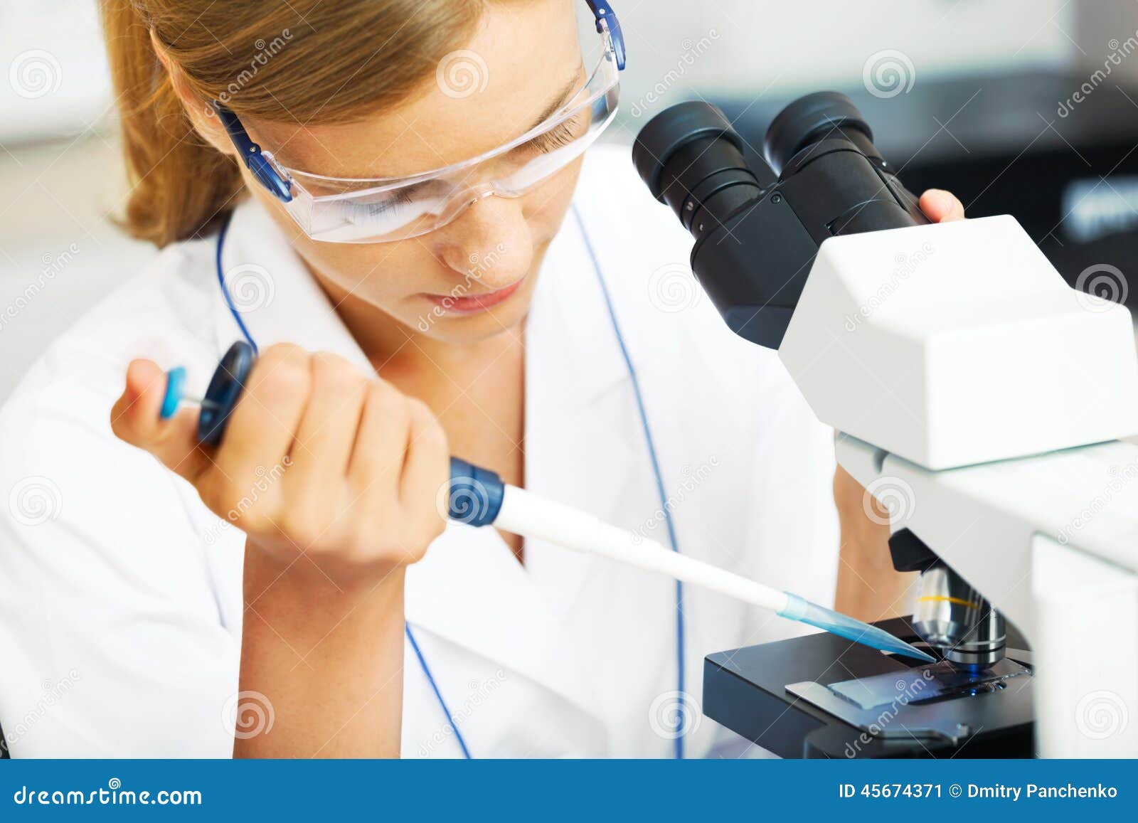 Woman Working with a Microscope. Stock Image - Image of pharmaceutical ...
