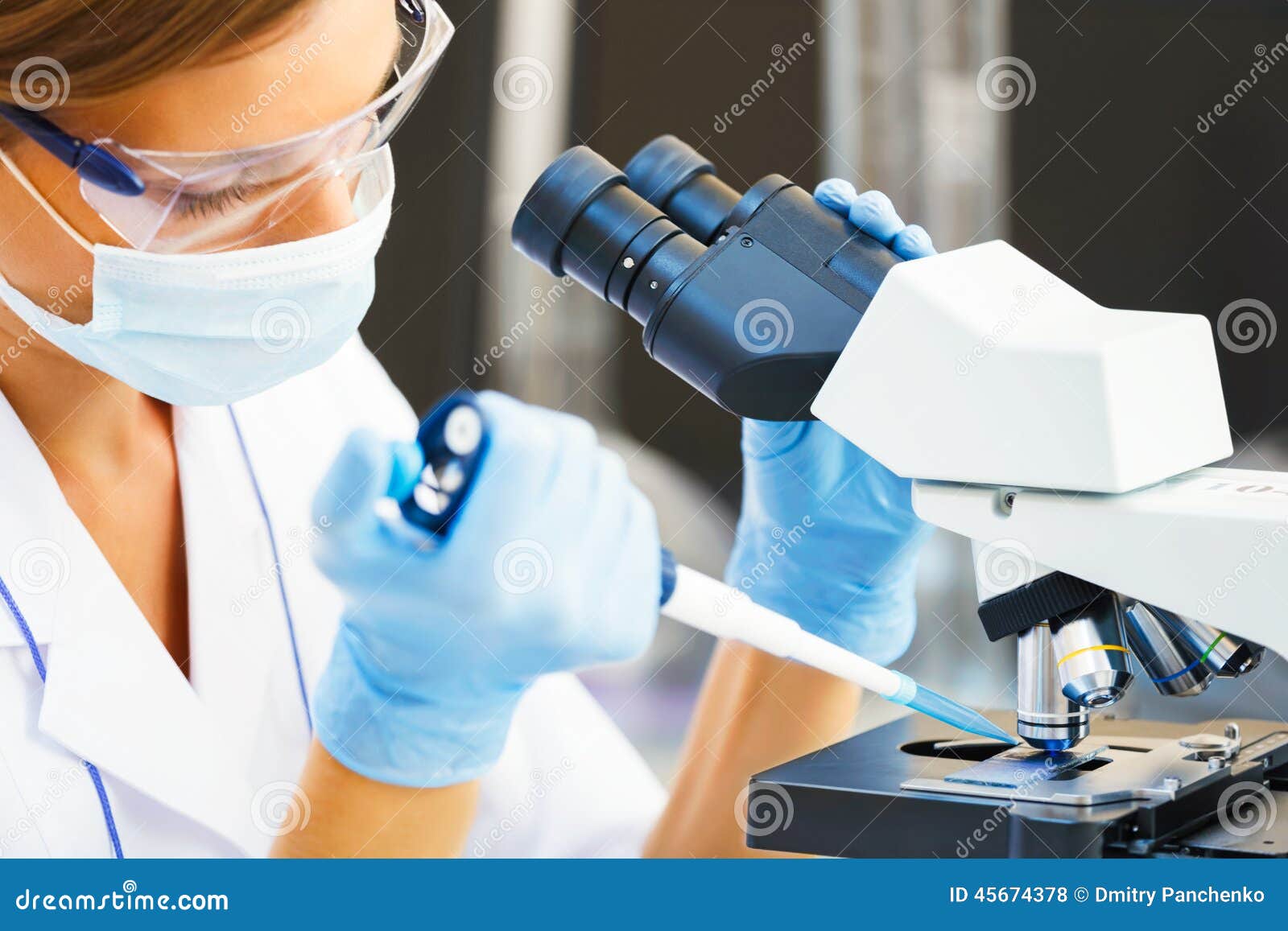 Woman Working with a Microscope. Stock Photo - Image of medicine ...