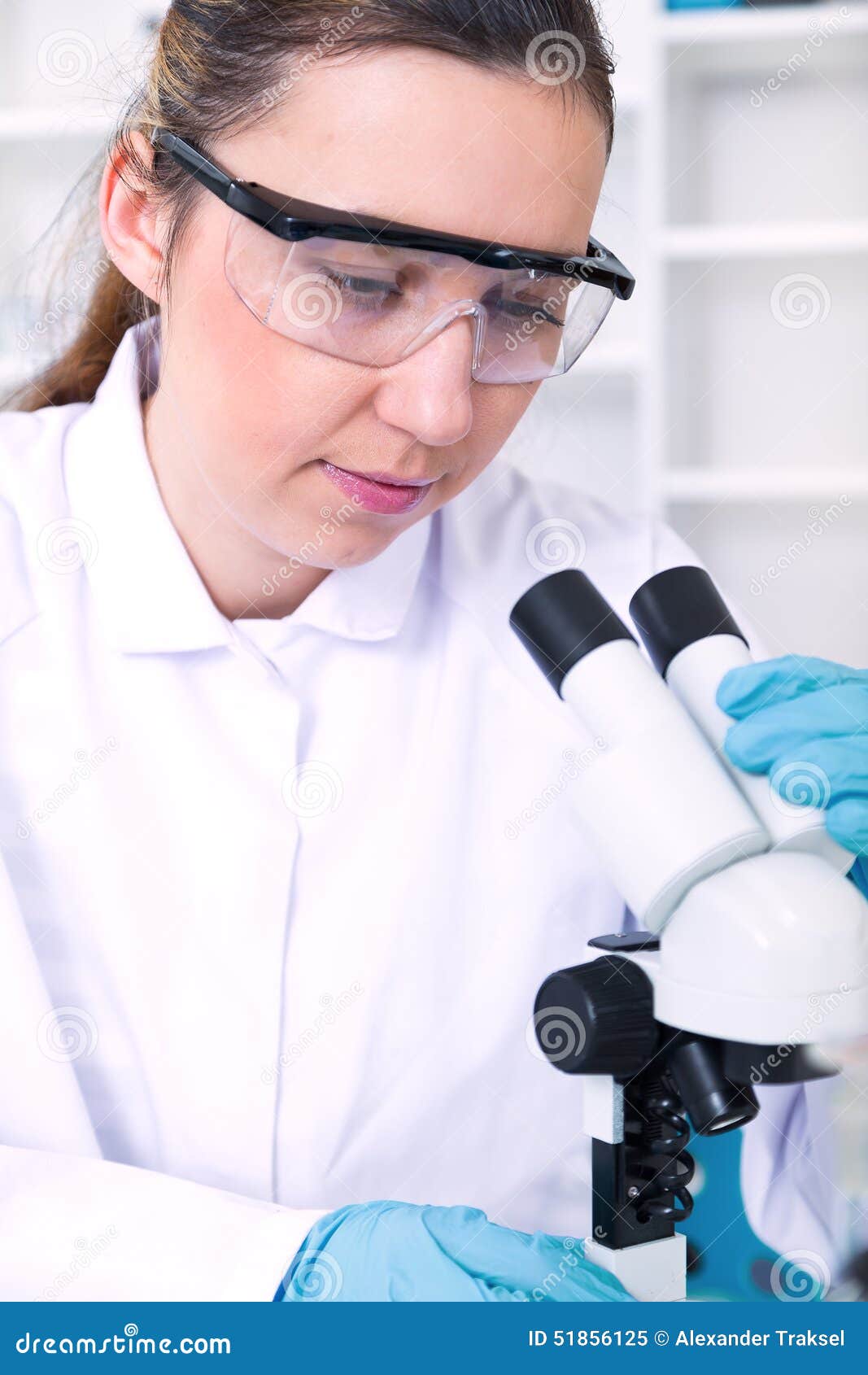 Woman Working with a Microscope in a Lab Stock Image - Image of ...