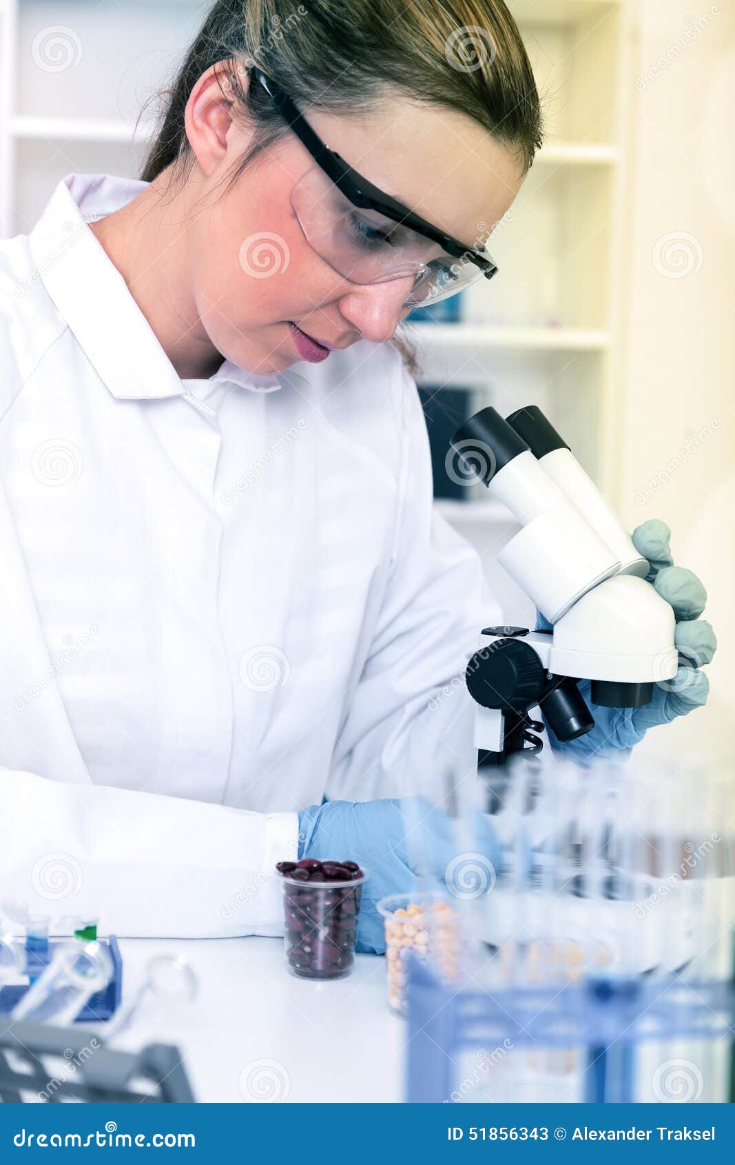 Woman Working with a Microscope in a Lab Stock Image - Image of coat ...
