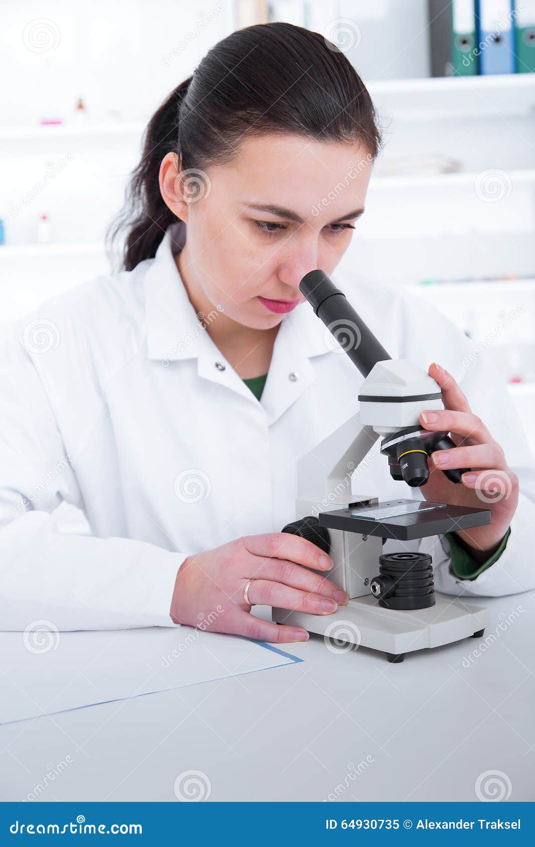 Woman Working with a Microscope in a Lab.Toning Image Stock Image ...