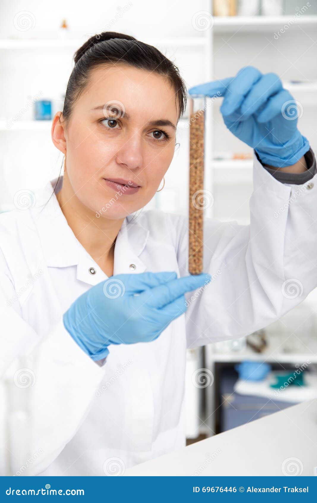 Woman Working with a Microscope in a Lab. Stock Photo - Image of ...