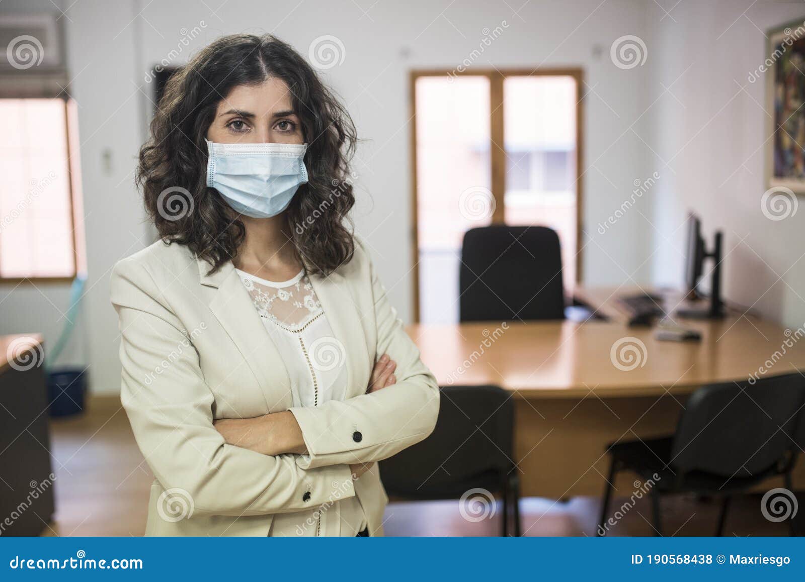 Woman Working in Office with Face Mask Posing and Looking at Camera ...