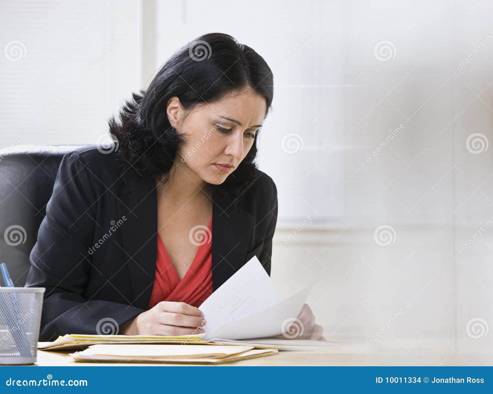 Woman Working on Paperwork stock photo. Image of accountant - 10011334