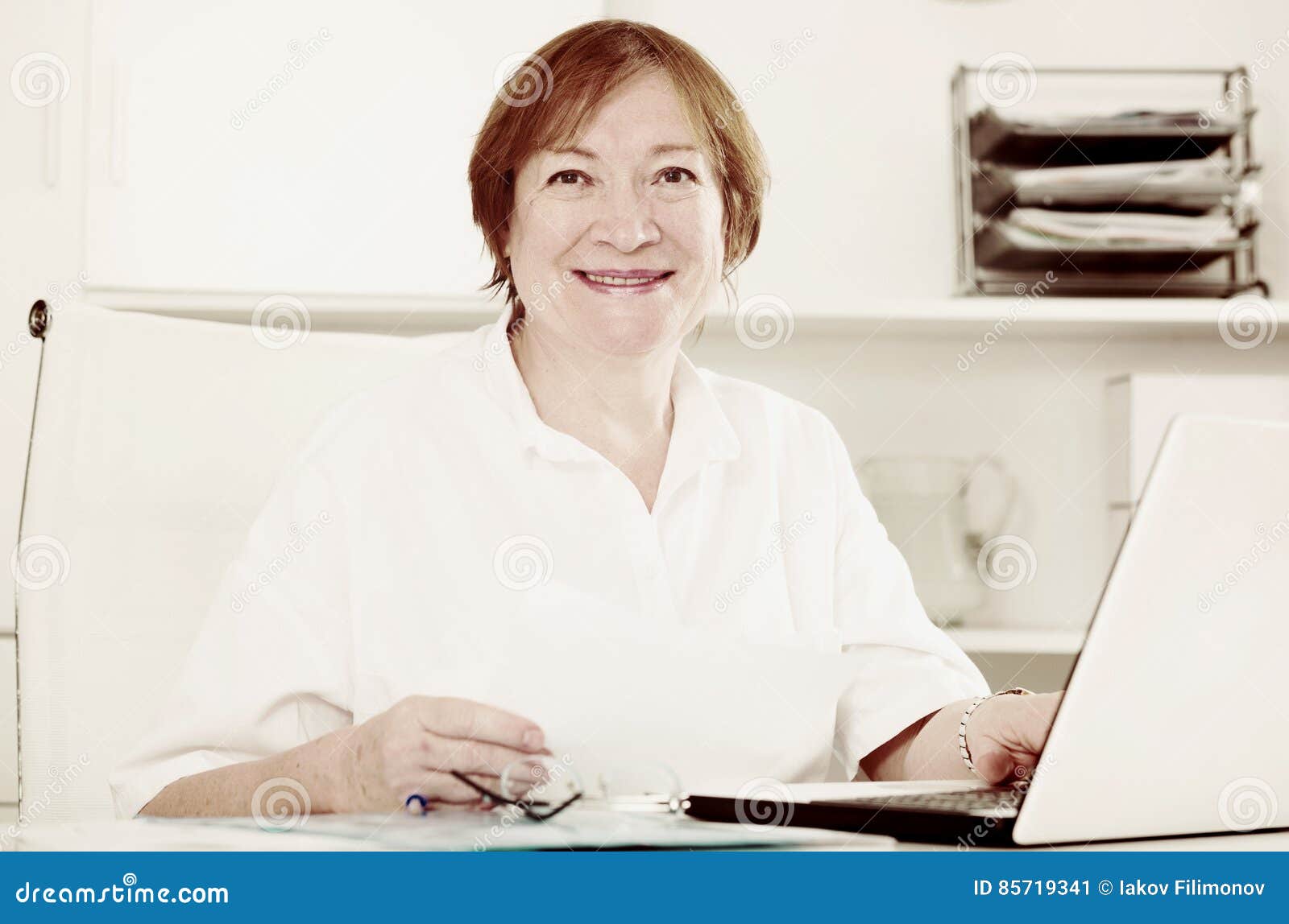 Woman working productively stock image. Image of industrious - 85719341