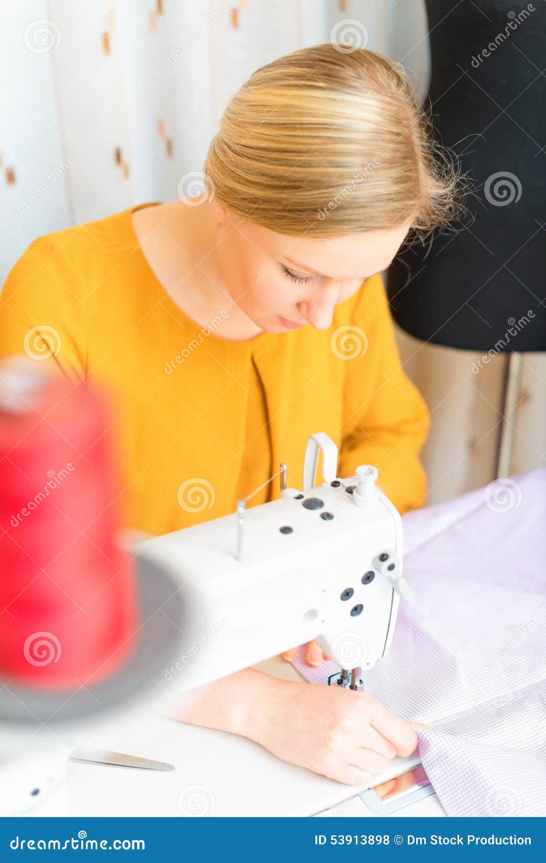 Woman Working on Sewing Machine. Stock Photo - Image of dressmaker ...