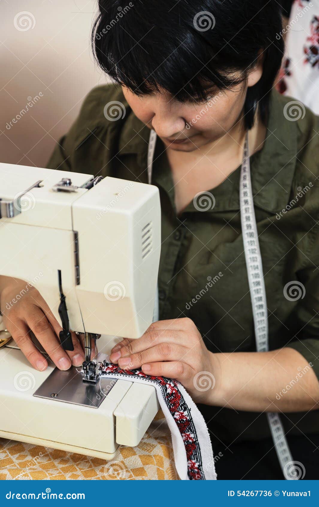 Woman Working on a Sewing Machine Stock Photo - Image of machine, hand ...