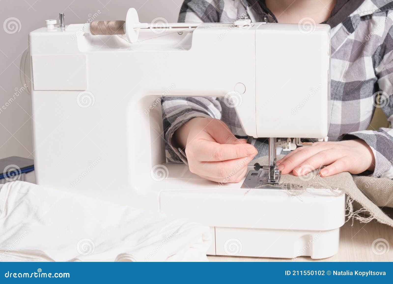 Woman Working with Sewing Machine, White Sewing Machine on the Table ...