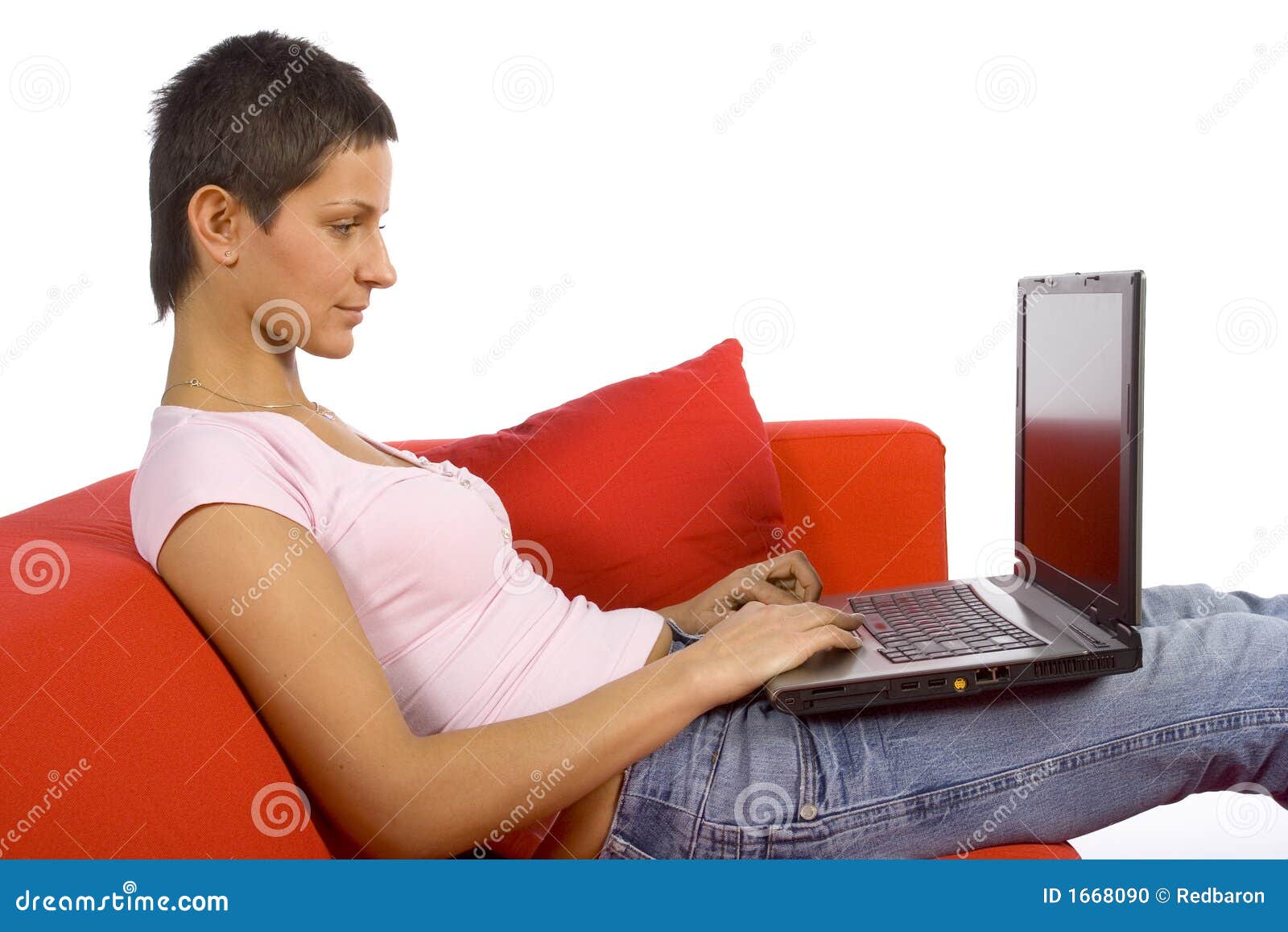 Woman working on the sofa stock photo. Image of comfort - 1668090