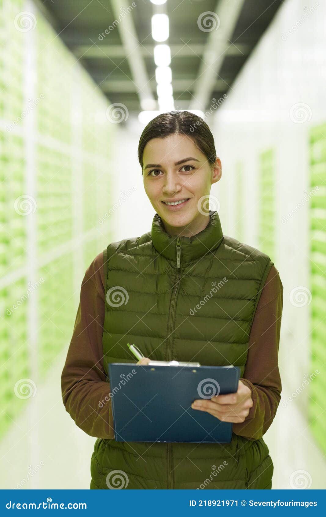 Woman working in storage stock image. Image of portrait - 218921971