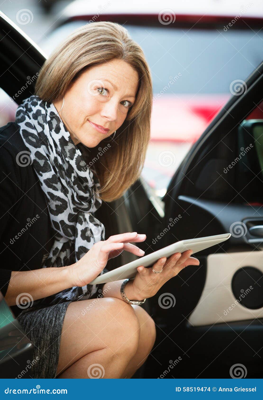 Woman Working on Tablet in Car Stock Photo - Image of outdoors, lady ...