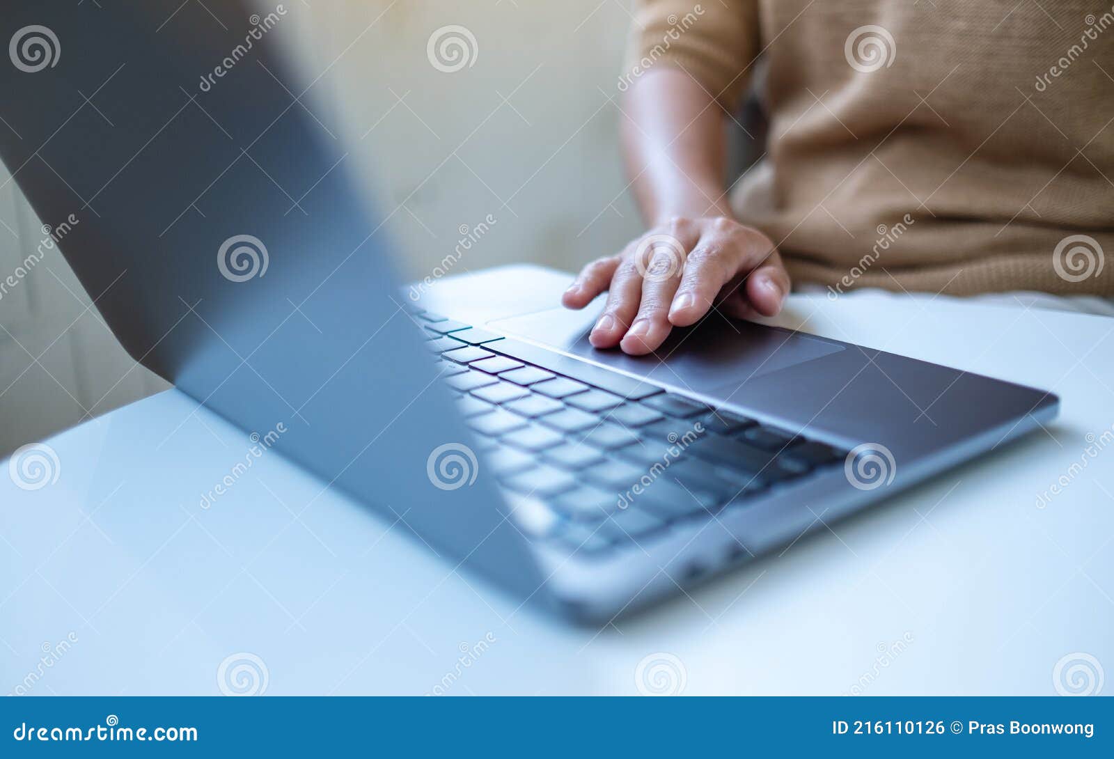 A Woman Working and Touching on Laptop Touchpad on the Table Stock ...