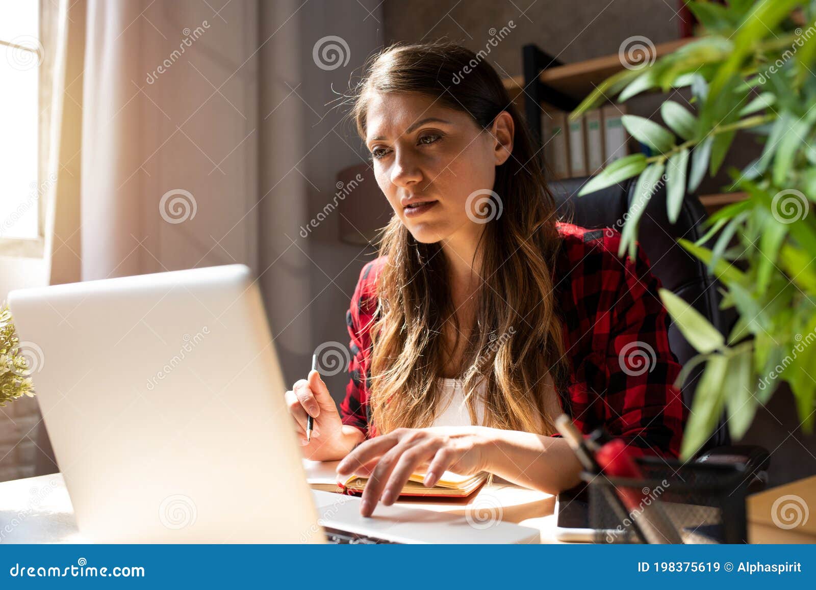 Woman Works at Home with Laptop. Concept of Smart Work Stock Image ...