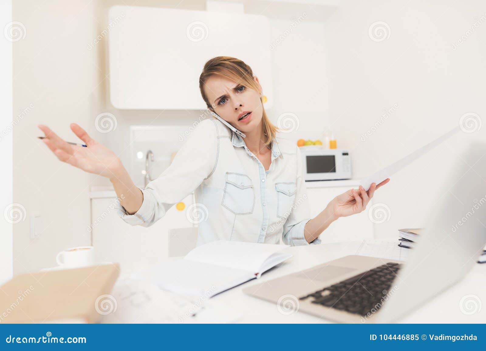 A Woman Works at Home. she Works on a Laptop Stock Image - Image of ...