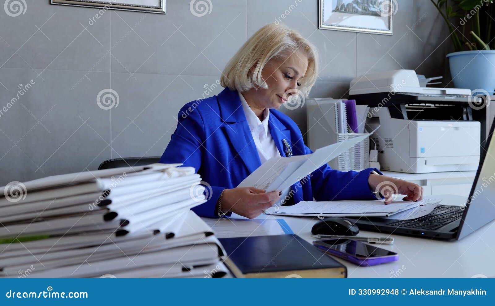 Woman Works in Office Handling Paperwork and Documents Routine Office ...