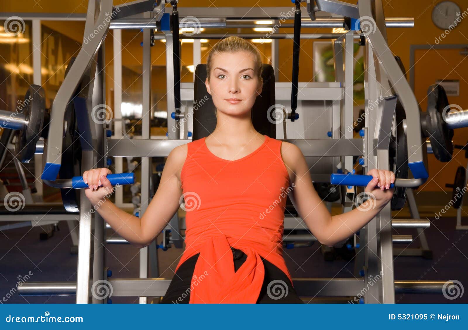 Woman works out in a gym stock image. Image of exertion - 5321095