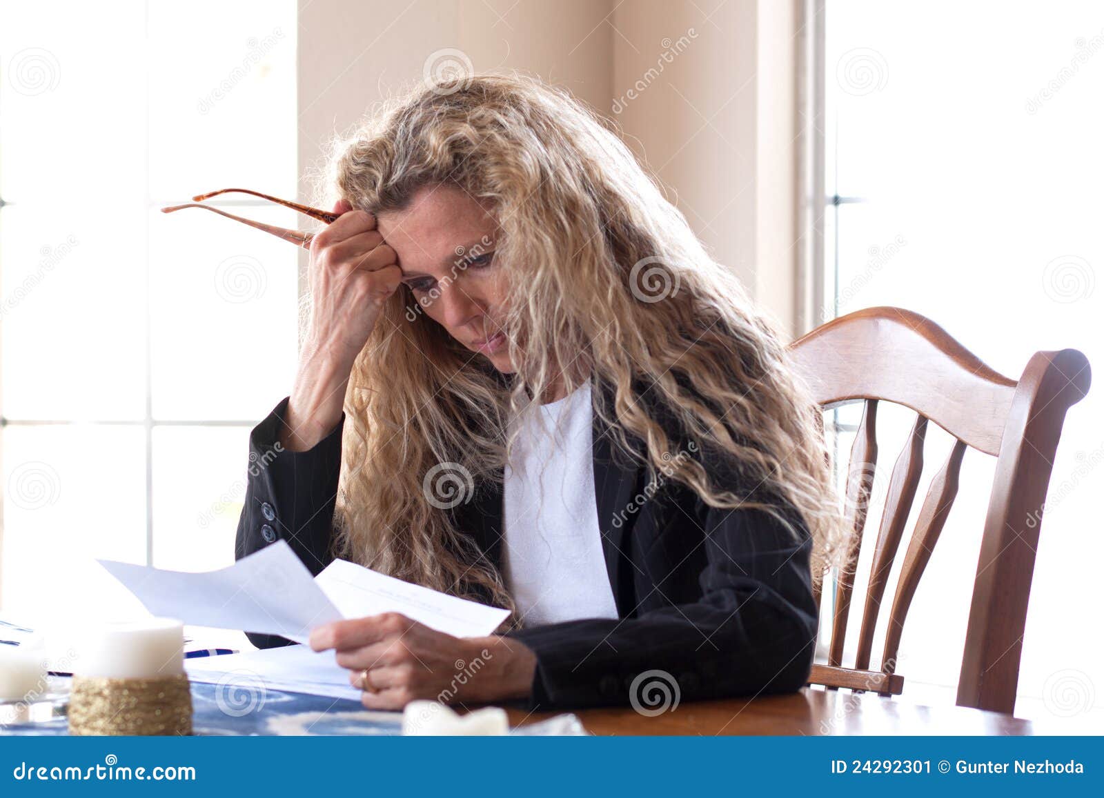 Woman worried about bills stock image. Image of domestic - 24292301