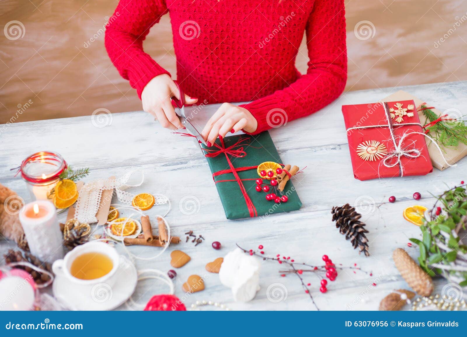 Woman wrapping gift stock photo. Image of people, holiday - 63076956