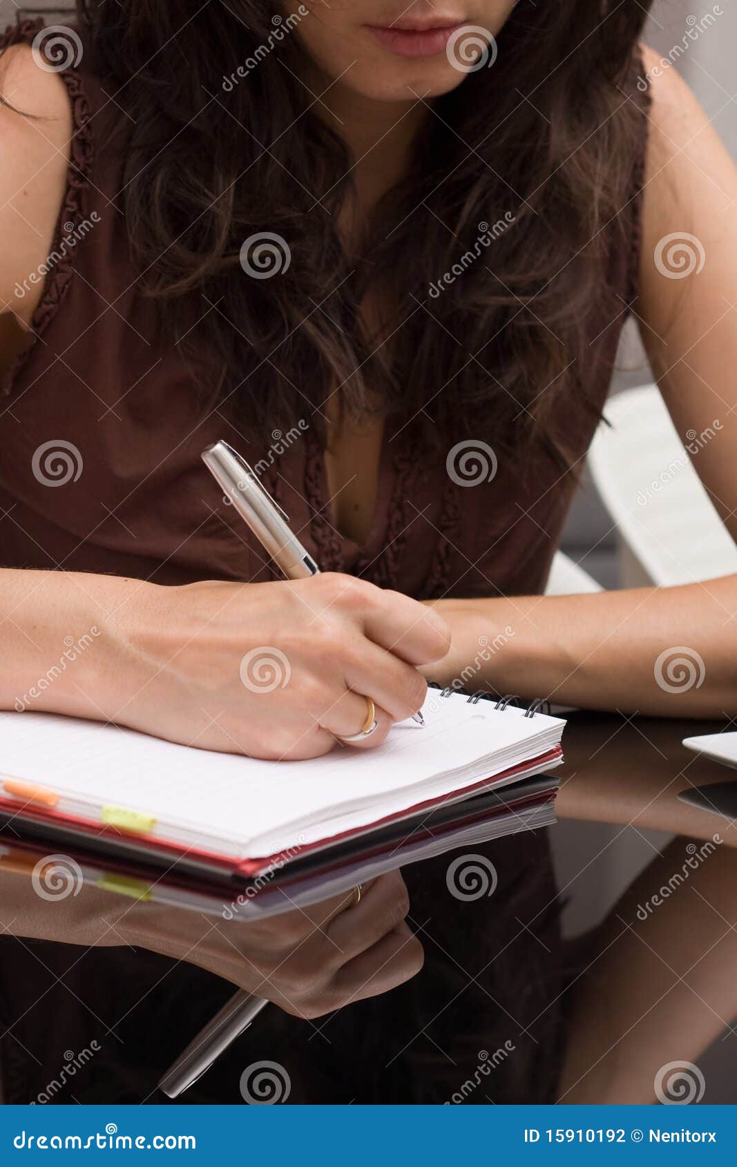 Woman writes on a paper stock photo. Image of message - 15910192