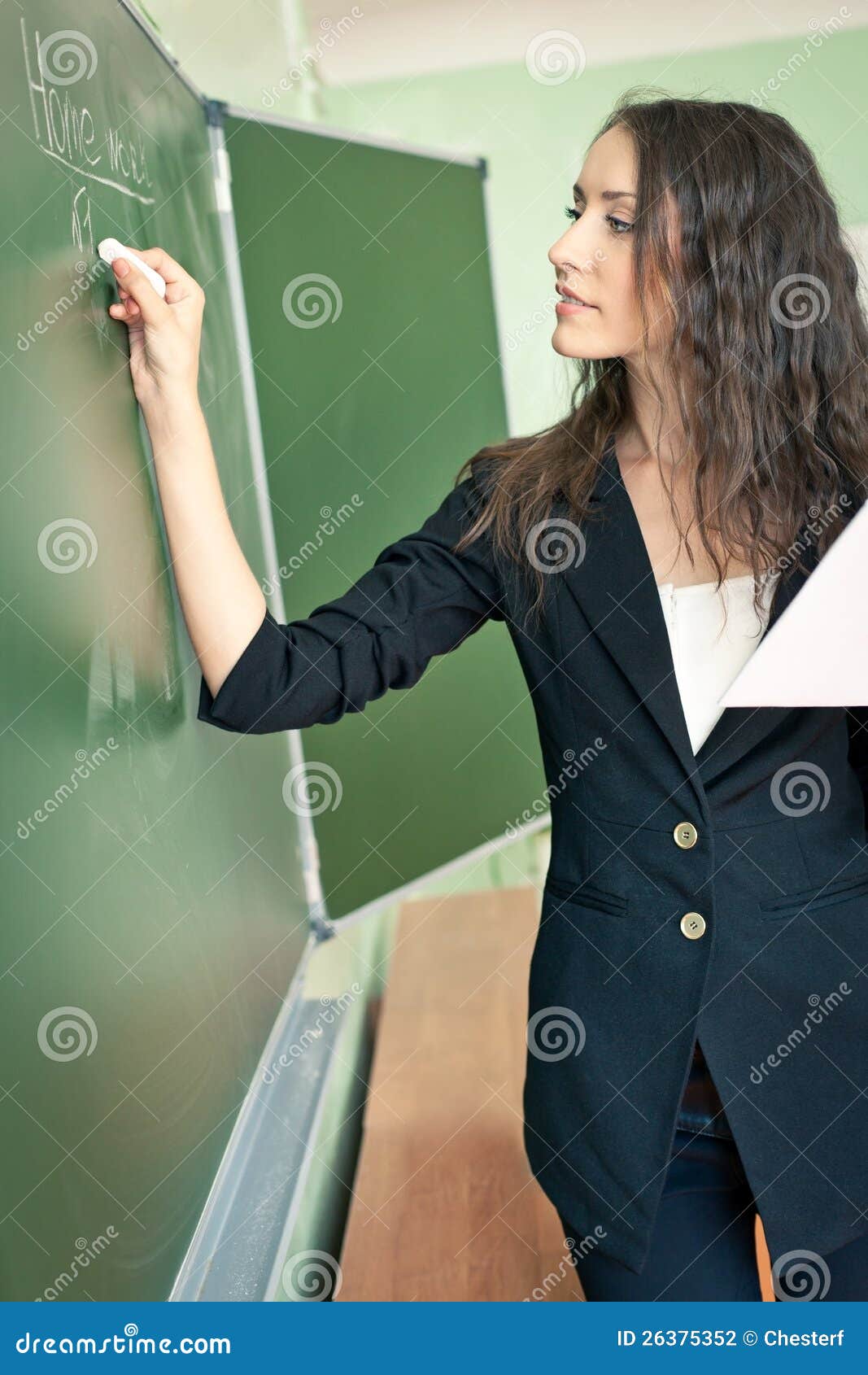 Woman Writing on Blackboard at Classroom Stock Photo - Image of ...