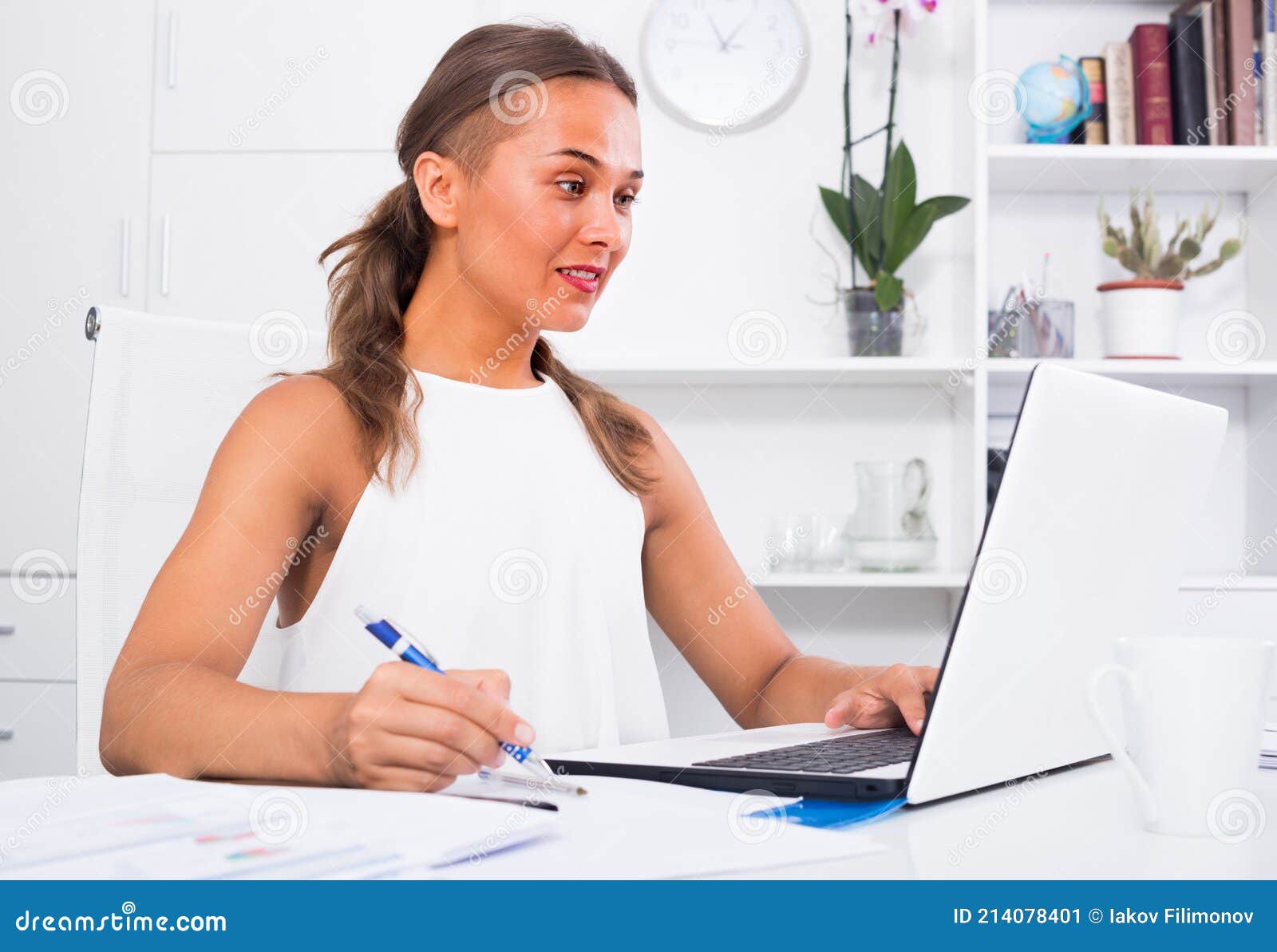 Woman Writing Down Information Stock Image - Image of digital, office ...