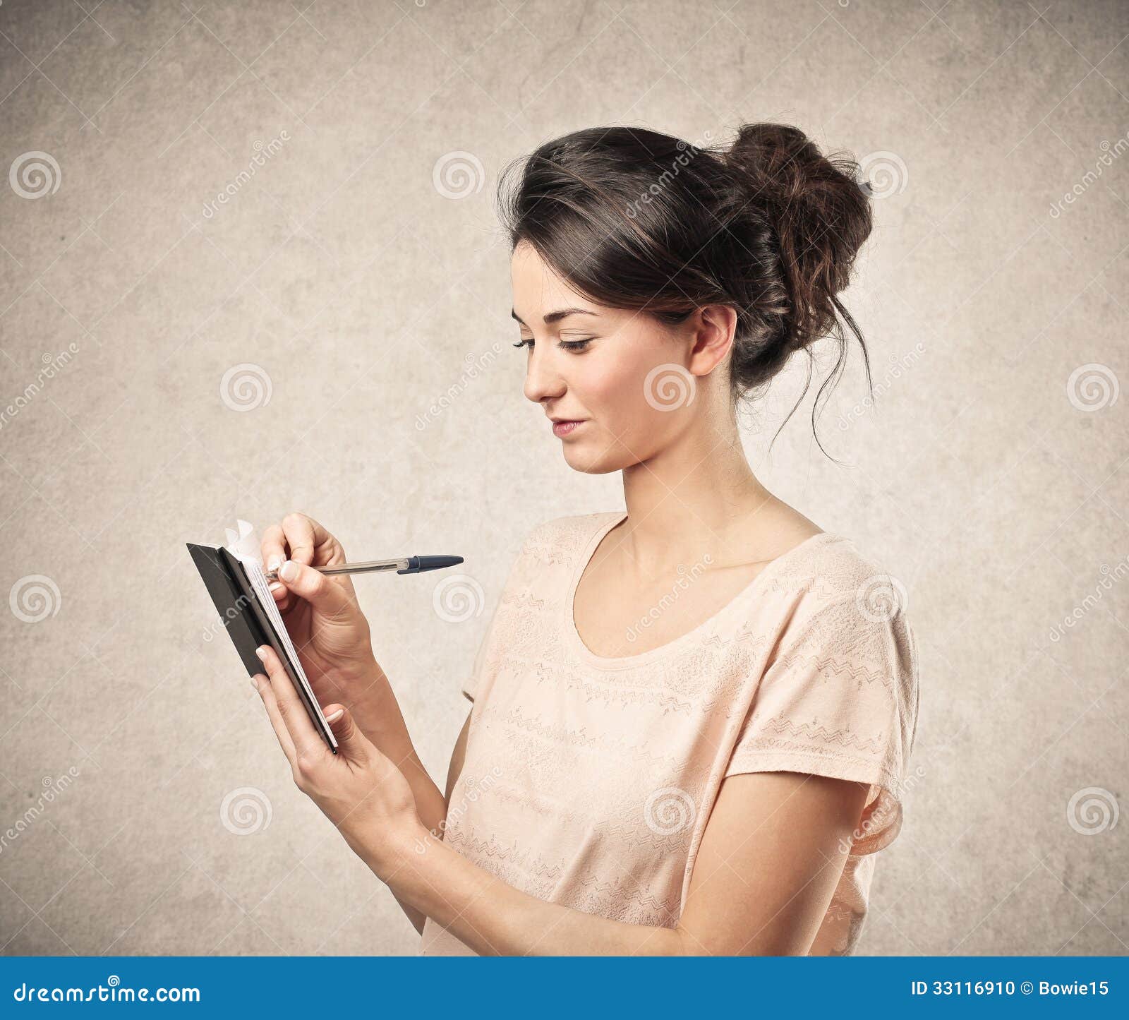 Woman Writing on Her Notebook Stock Photo - Image of studio, caucasian ...