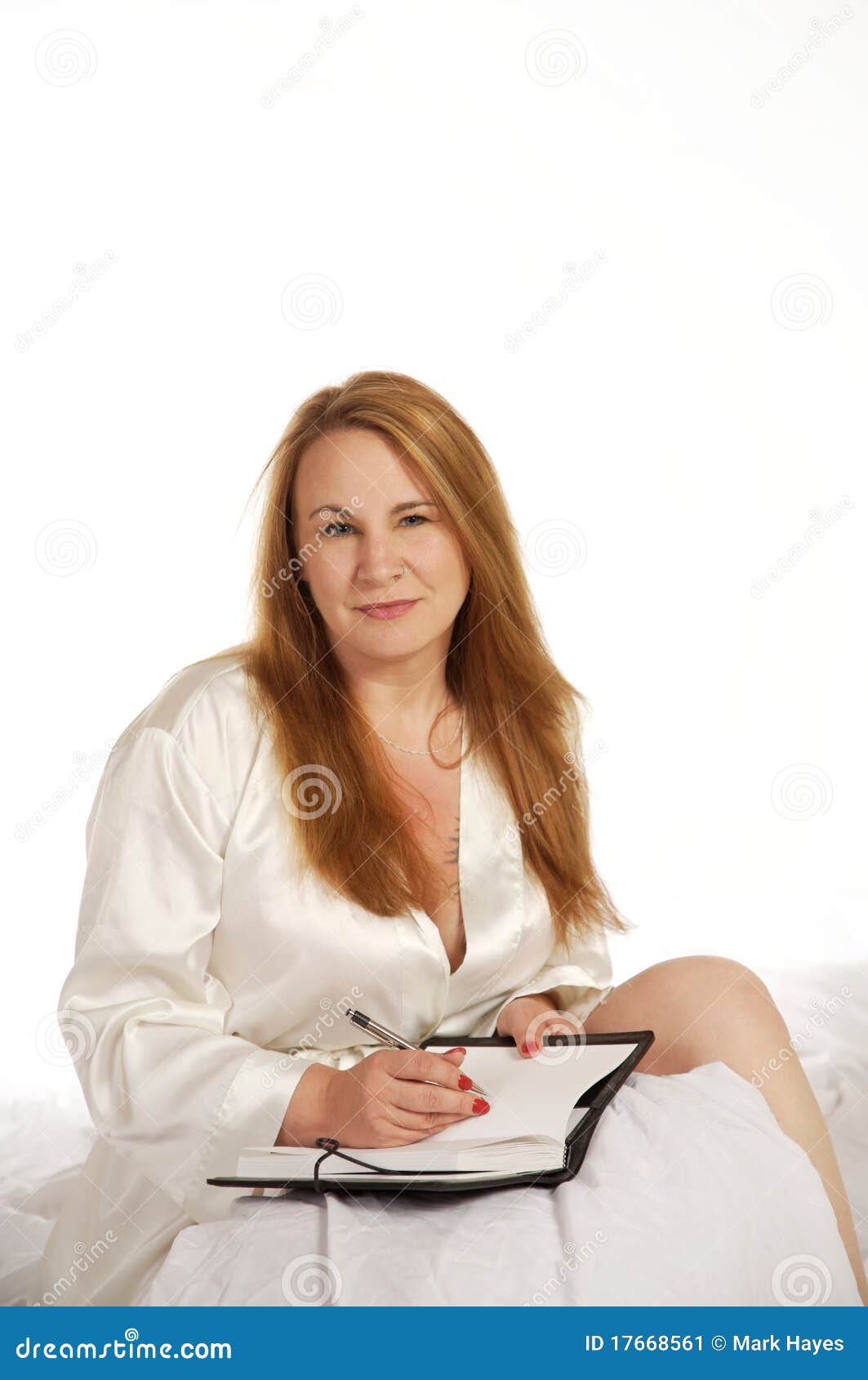 Woman writing in journal stock image. Image of women - 17668561