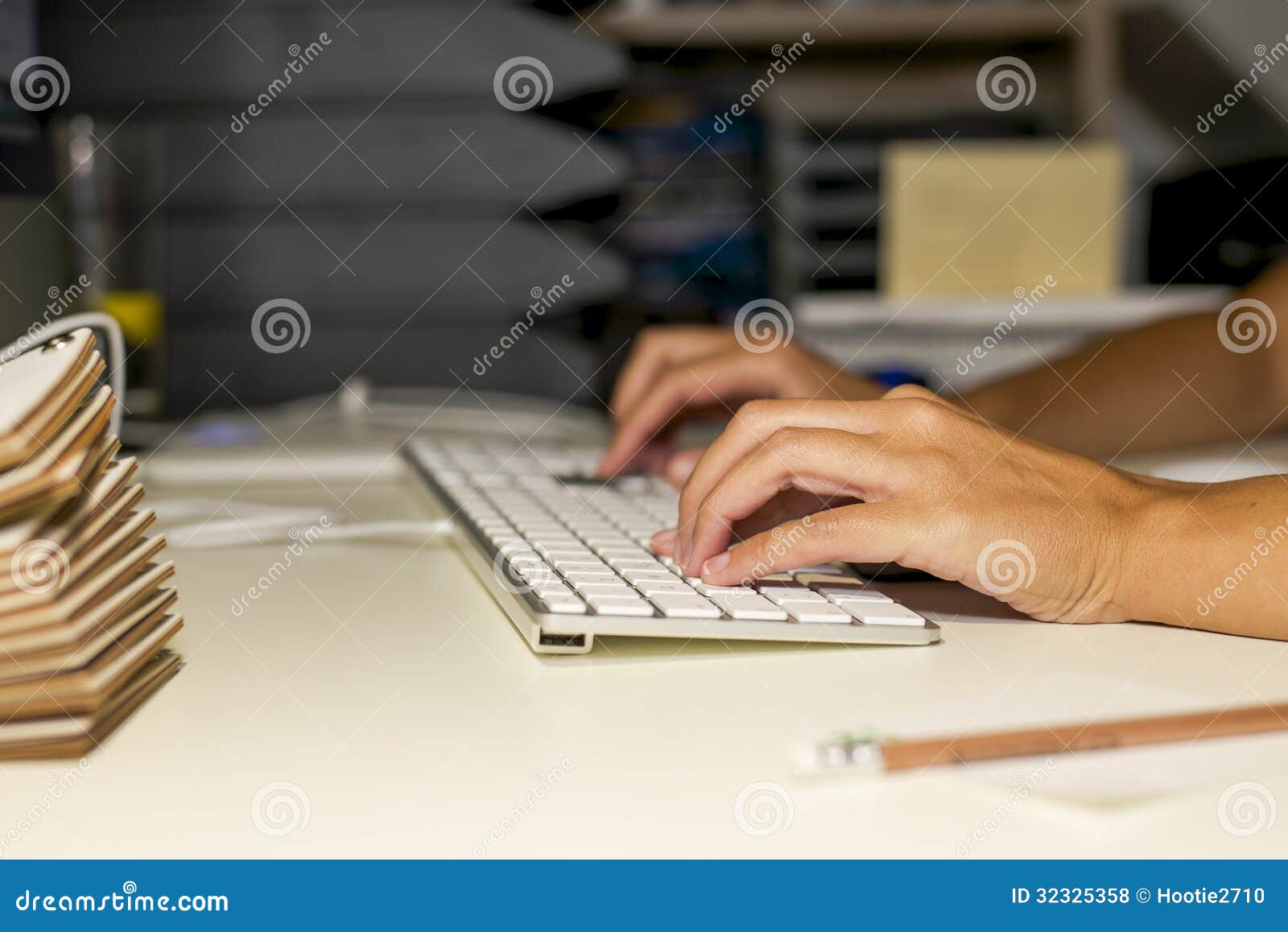 Woman writing on keyboard stock photo. Image of pencil - 32325358