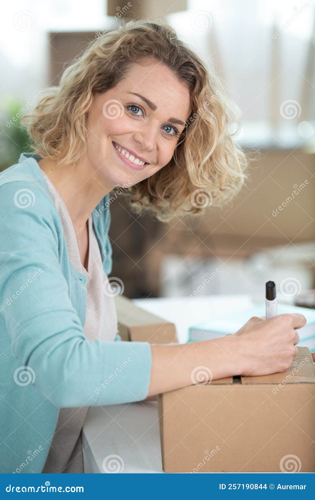 Woman Writing Label on Parcel Stock Photo - Image of parcel, label ...