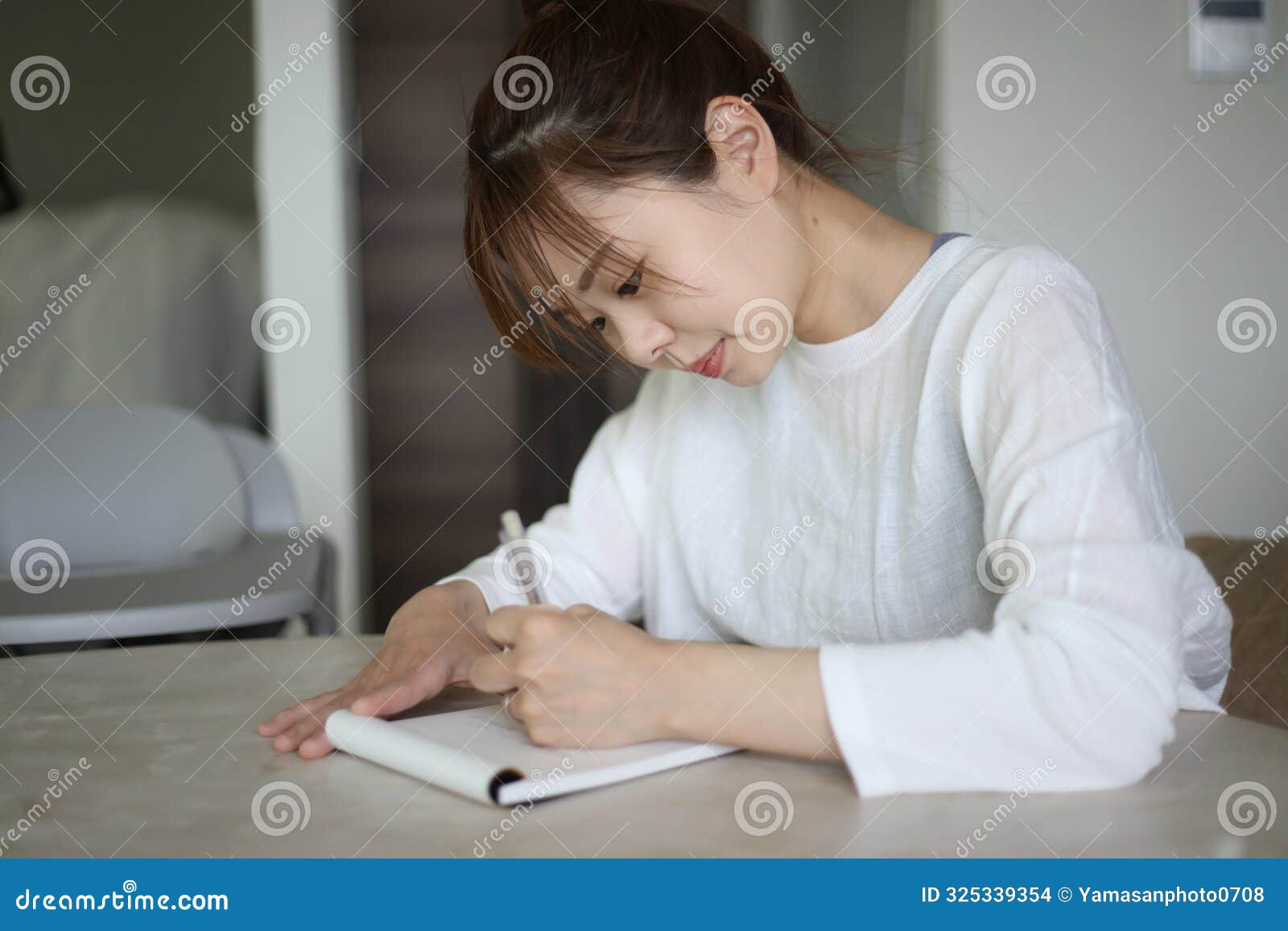 Woman writing a letter stock photo. Image of practice - 325339354
