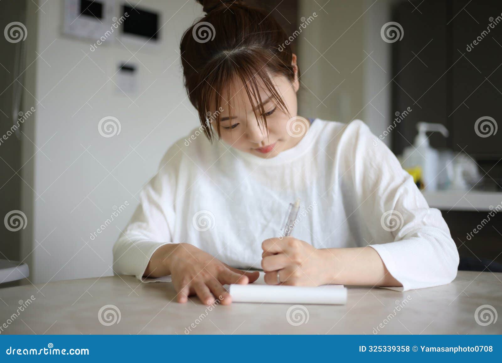 Woman writing a letter stock photo. Image of writing - 325339358