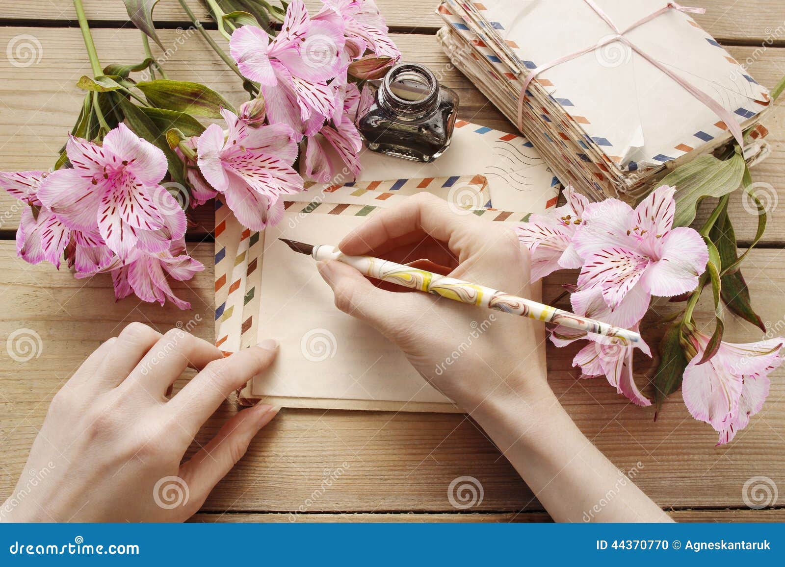 Woman writing a letter stock photo. Image of flora, lily - 44370770