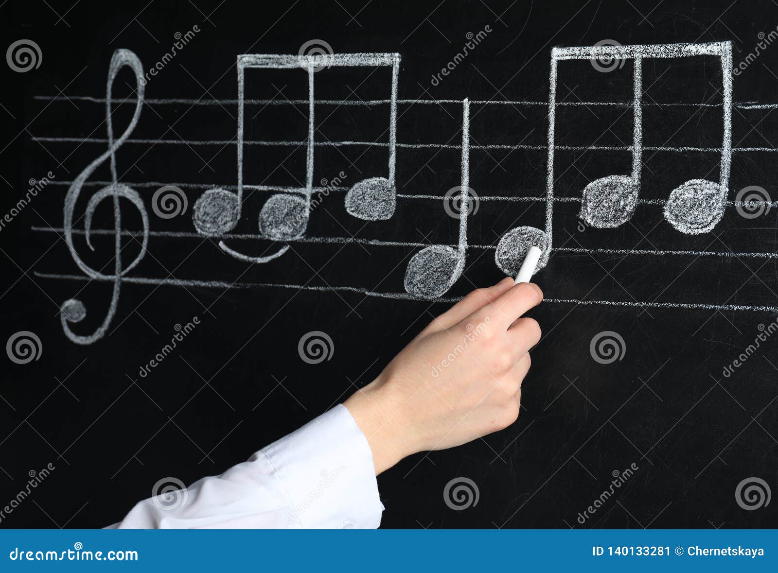 Woman Writing Music Notes with Chalk on Blackboard Stock Image - Image ...