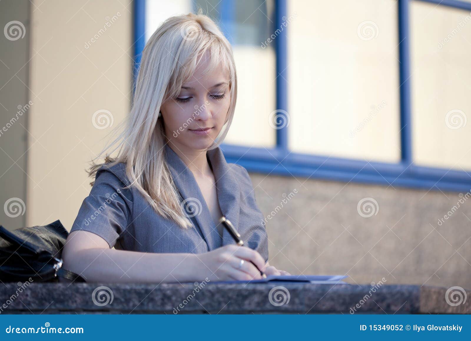 Woman writing a note stock photo. Image of standing, note - 15349052