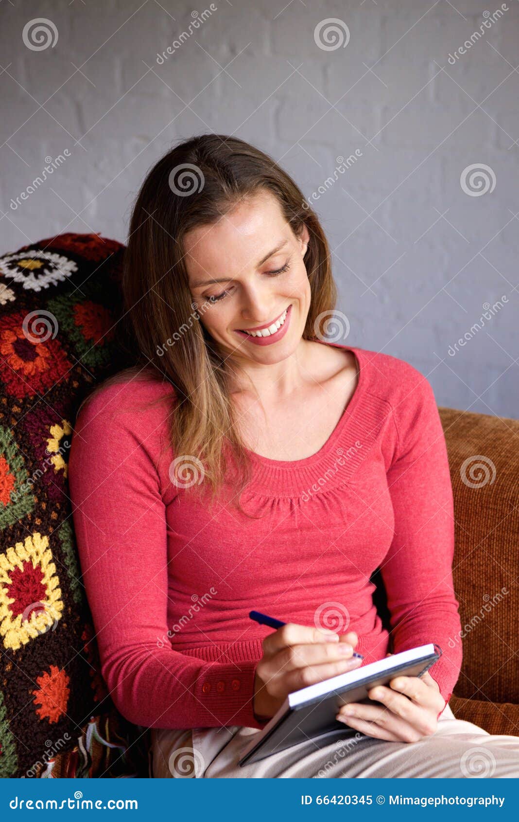 Woman Writing in Notebook at Home Stock Image - Image of aged, casual ...