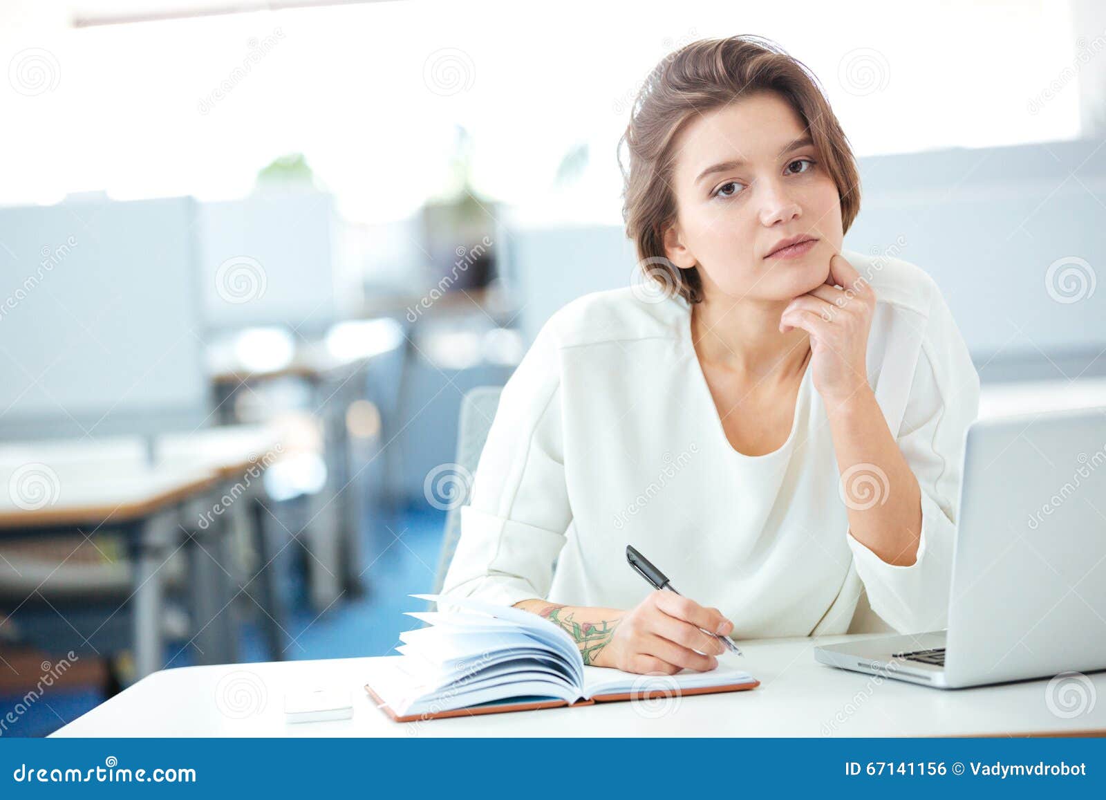 Woman Writing Notes in Office Stock Photo - Image of beautiful ...