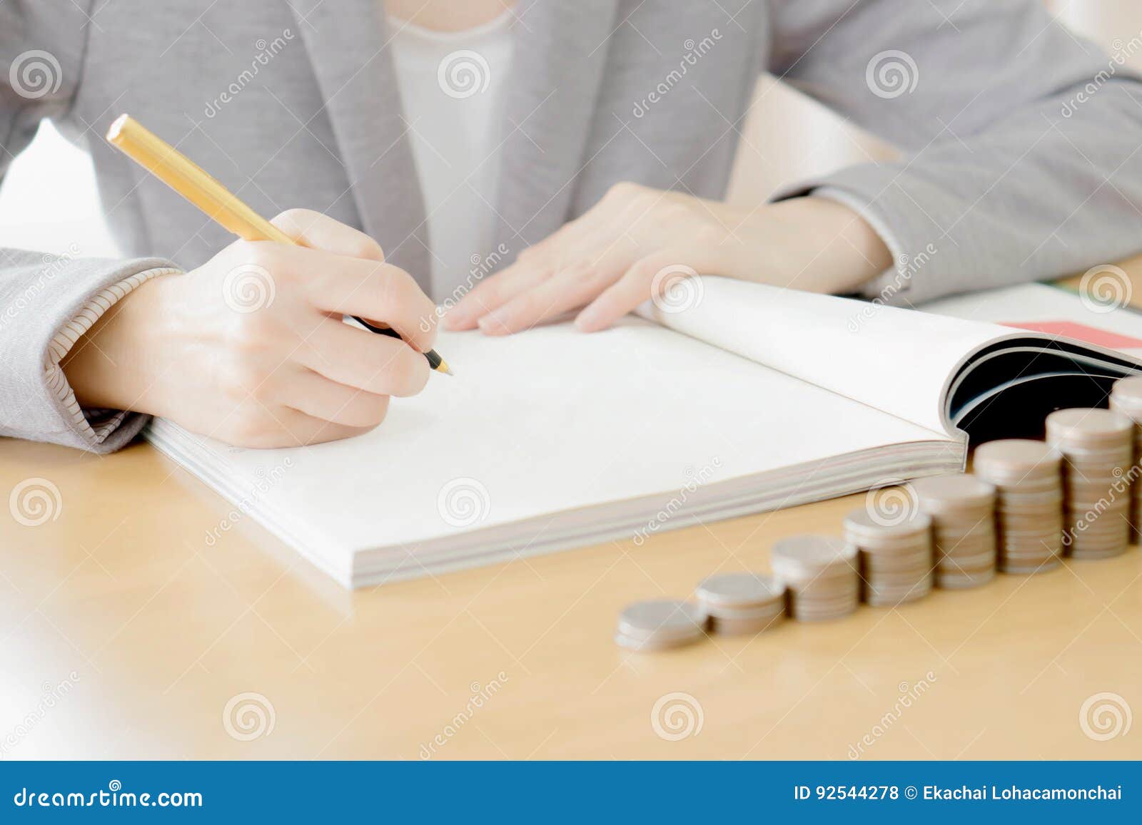 Woman writing on paper stock photo. Image of book, stacking - 92544278