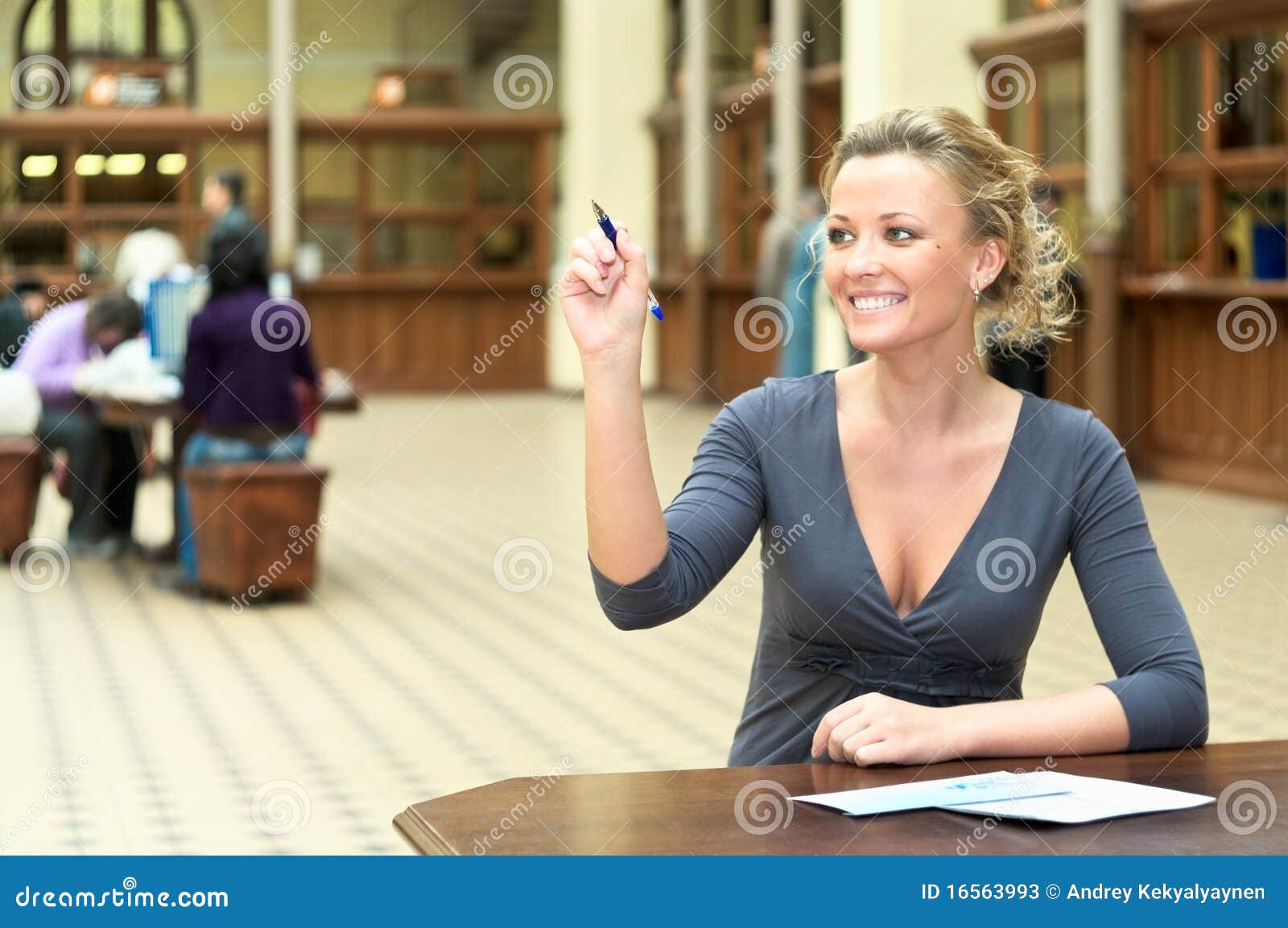 Woman writing with a pen stock image. Image of beauty - 16563993